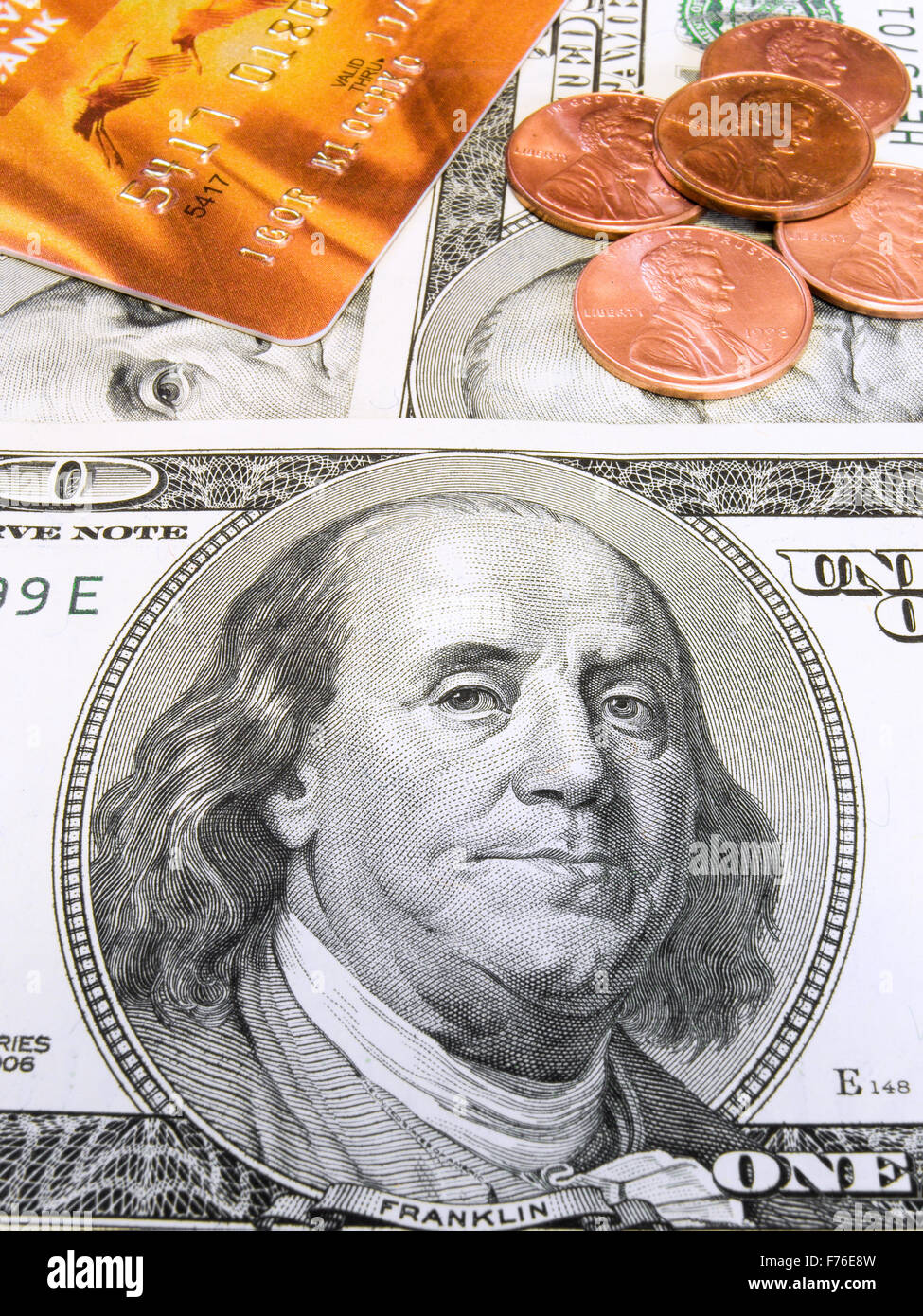 Credit card and penny Stock Photo - Alamy