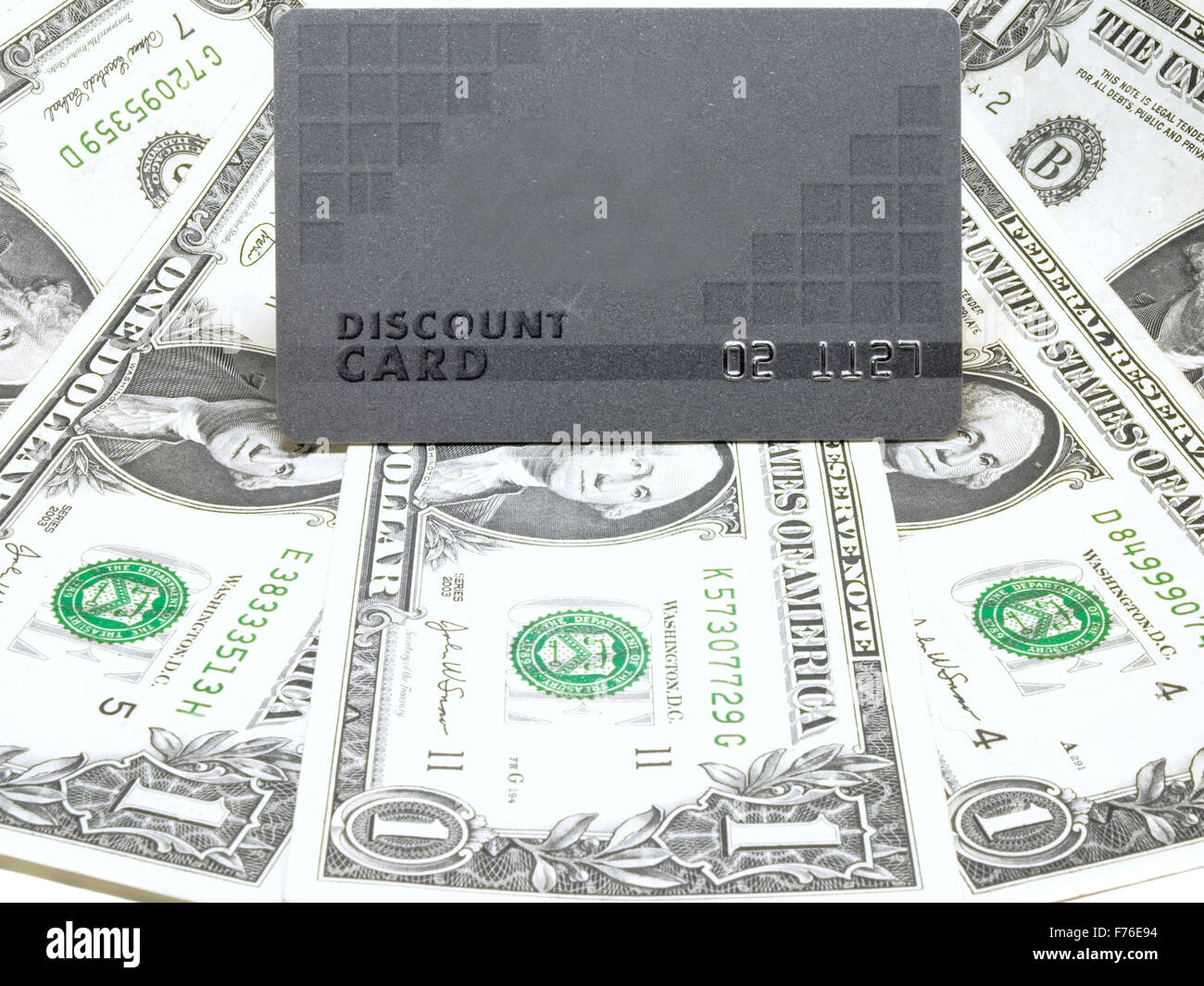 Discount card and money Stock Photo - Alamy