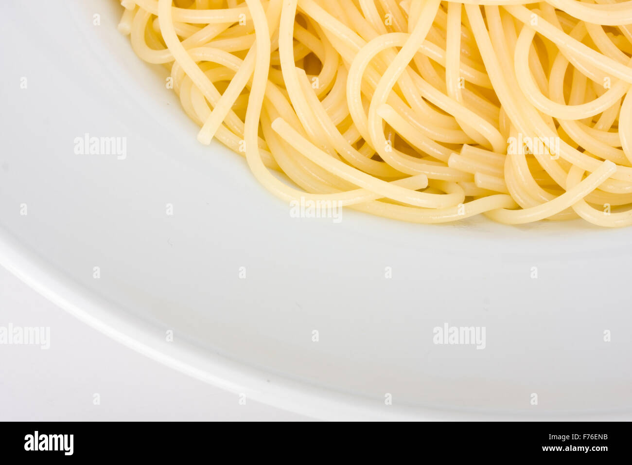 spaghetti in a white plate on clear background Stock Photo - Alamy