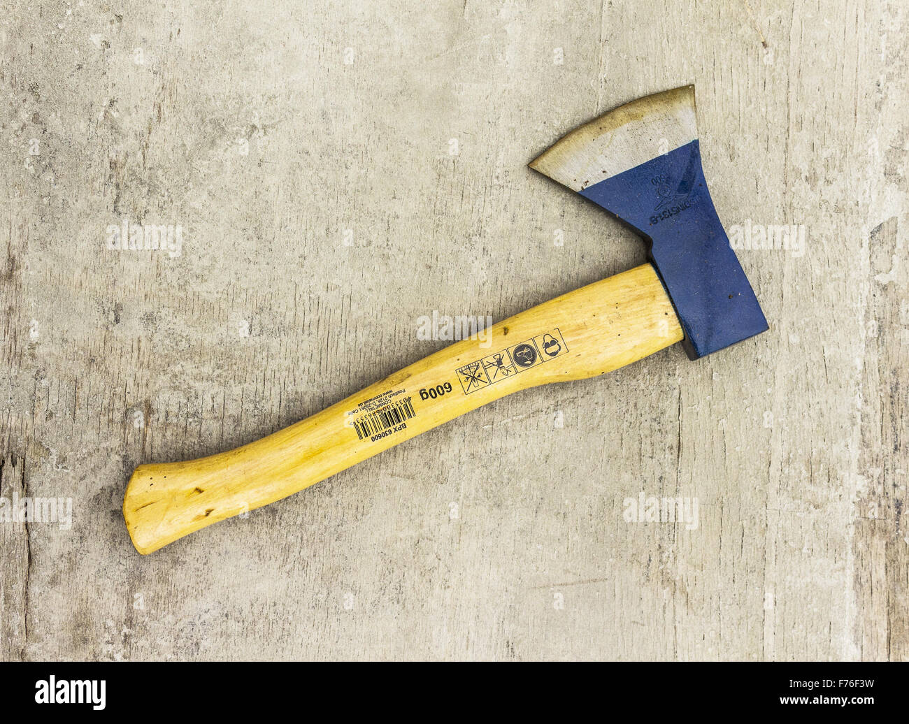 An ax on a grunge background Stock Photo - Alamy