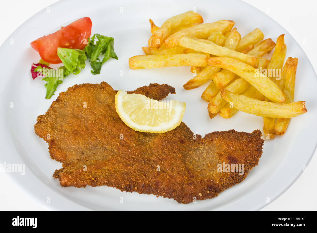 Wiener schnitzel with fries on a plate hi-res stock photography and ...