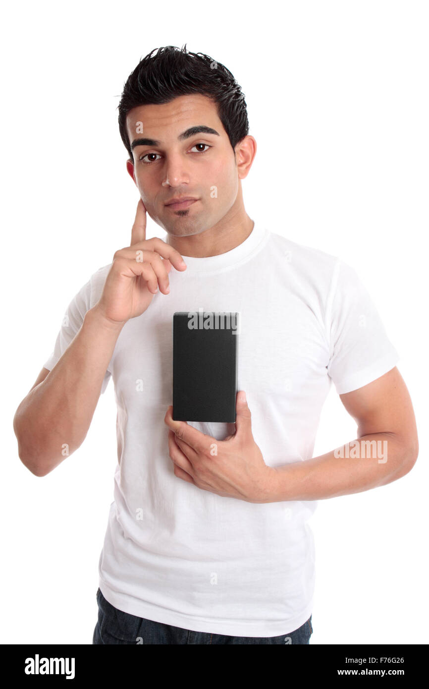 Man considering a product Stock Photo - Alamy