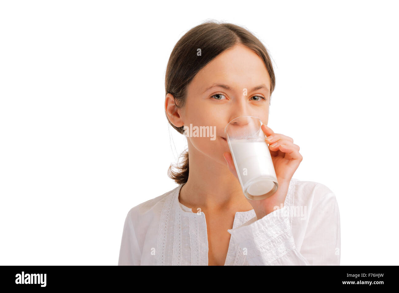 Portrait of woman drinking milk Stock Photo - Alamy