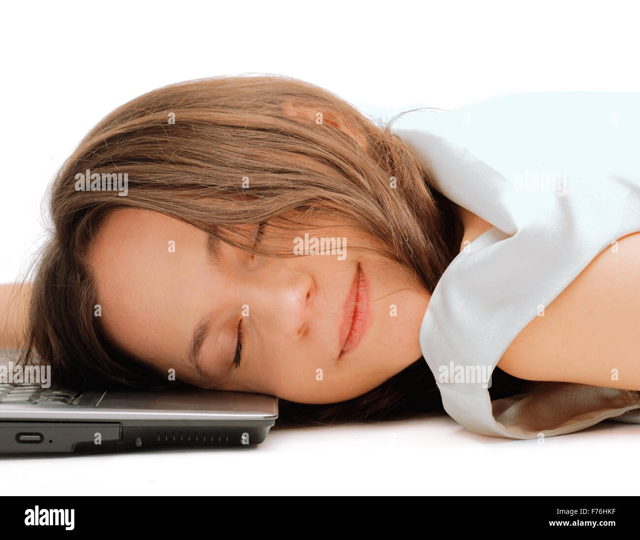 Woman sleeping on the laptop Stock Photo - Alamy