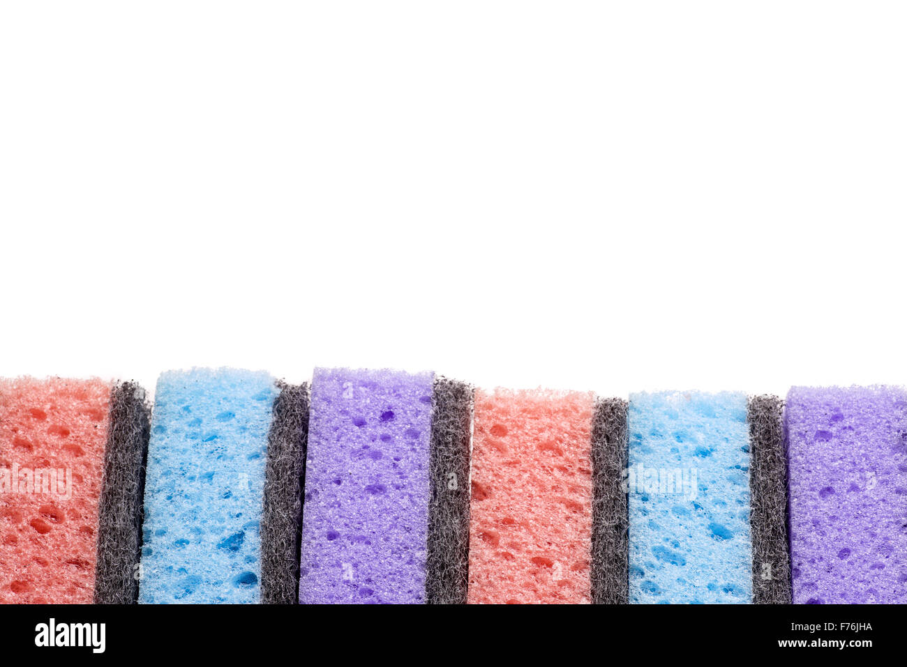 Lots of Cleaning sponges in several colors Stock Photo - Alamy