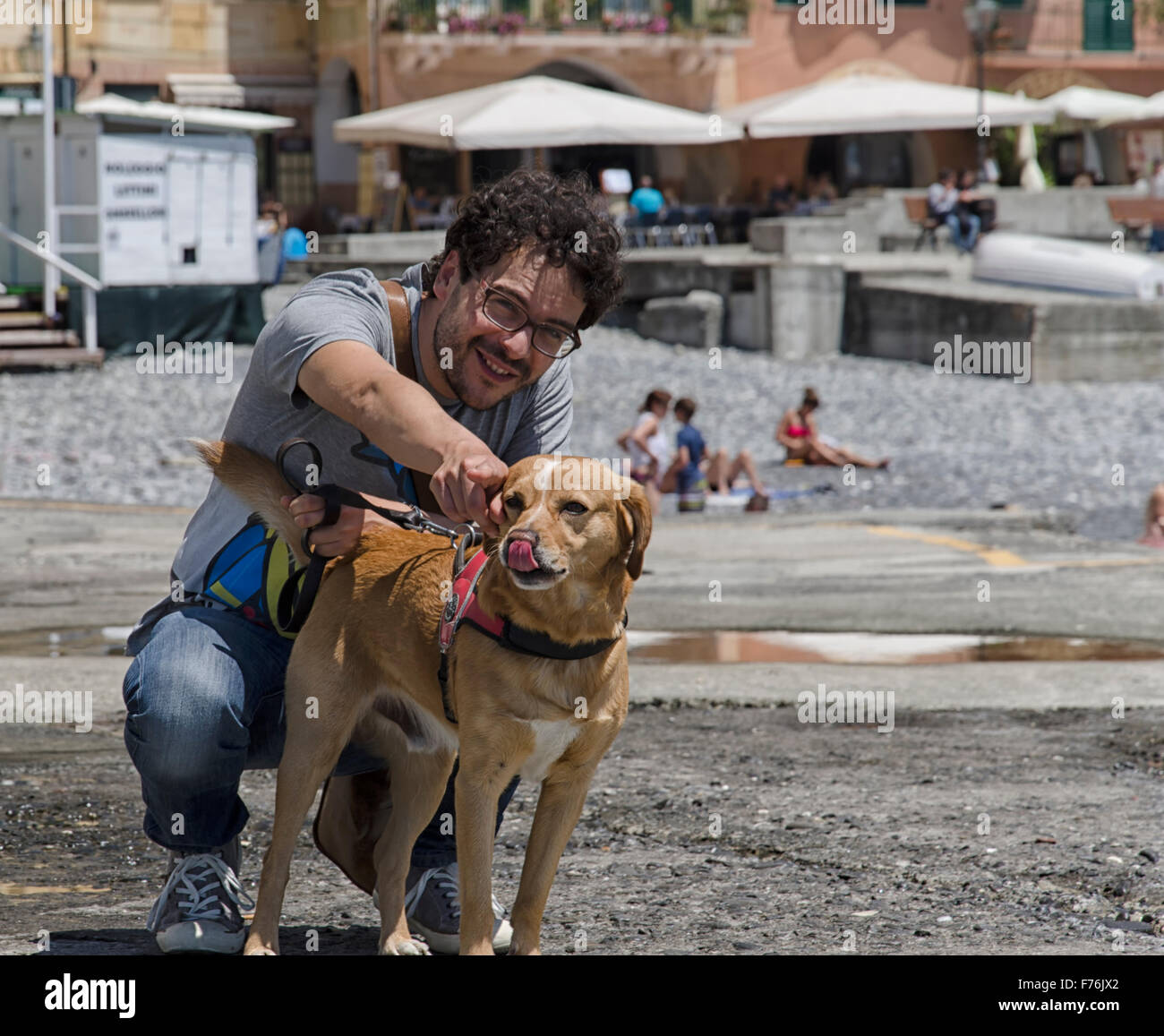 Man and dog on holiday in Italy Stock Photo - Alamy