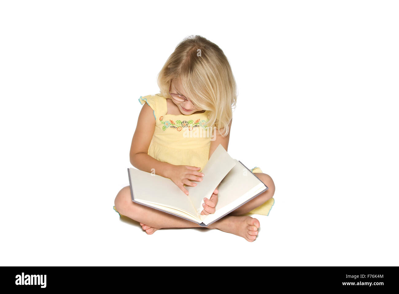 Little Girl Reading Stock Photo - Alamy