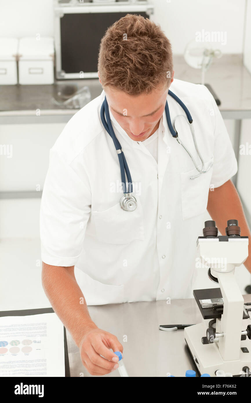 Blond doctor in bio lab Stock Photo - Alamy
