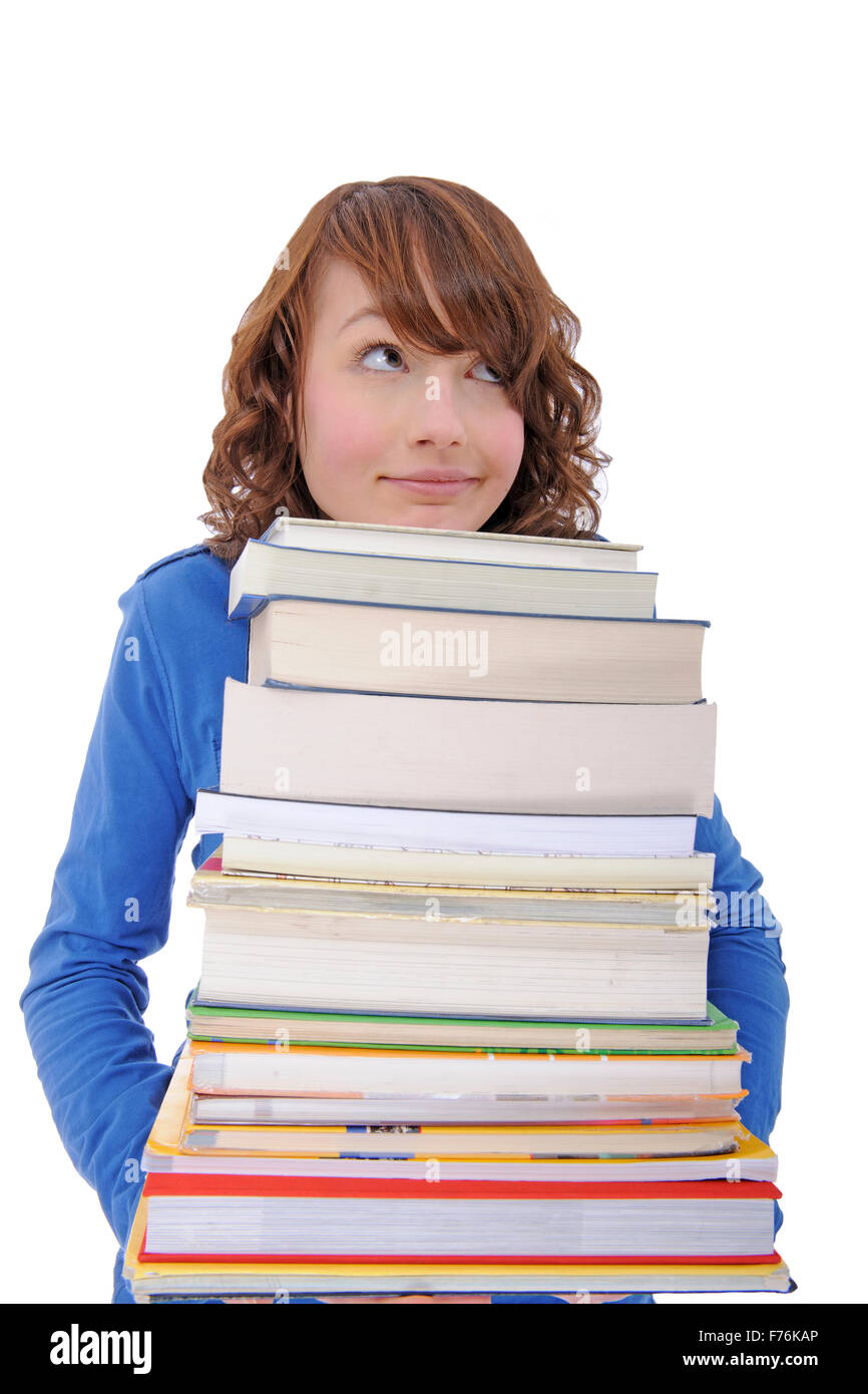 young student carrying a heavy stack of books Stock Photo - Alamy
