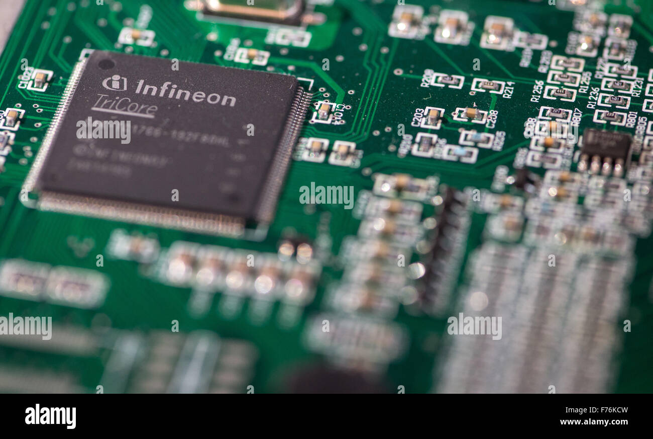 Neubiberg, Germany. 26th Nov, 2015. A 32-bit processor from Infineon on ...
