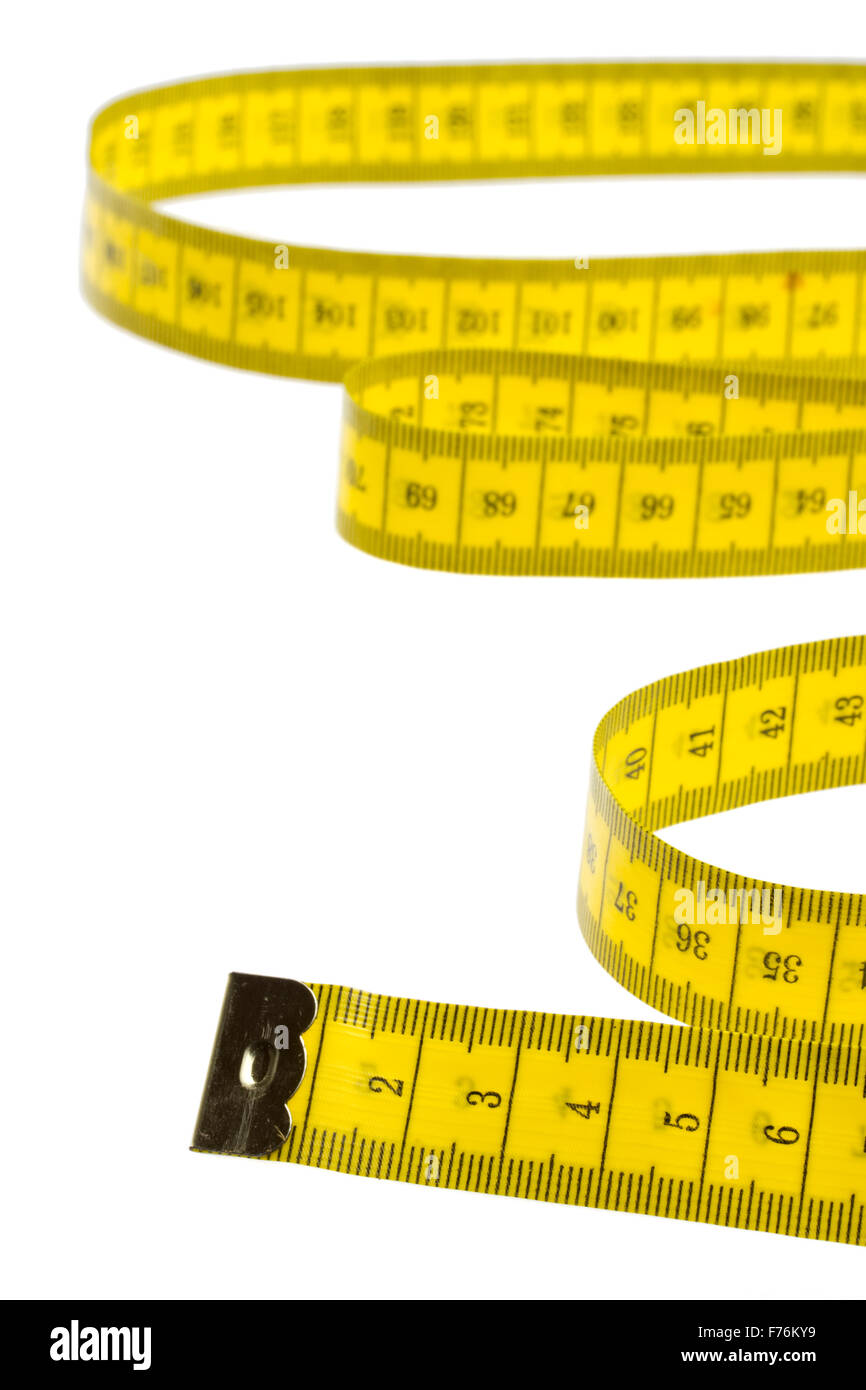 yellow measuring tape isolated on white background Stock Photo - Alamy