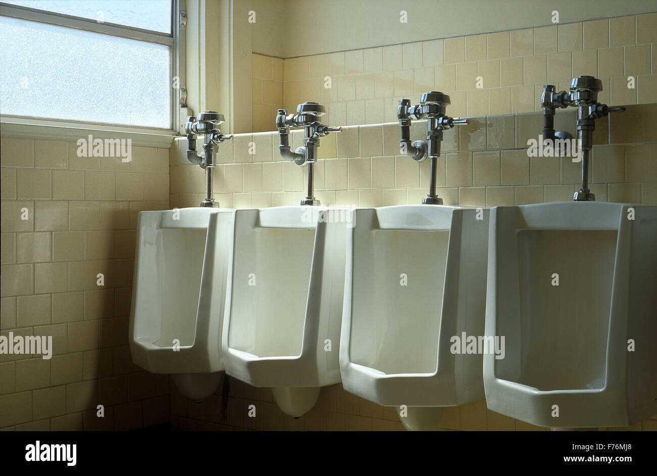 Row Of Urinals Stock Photo - Alamy