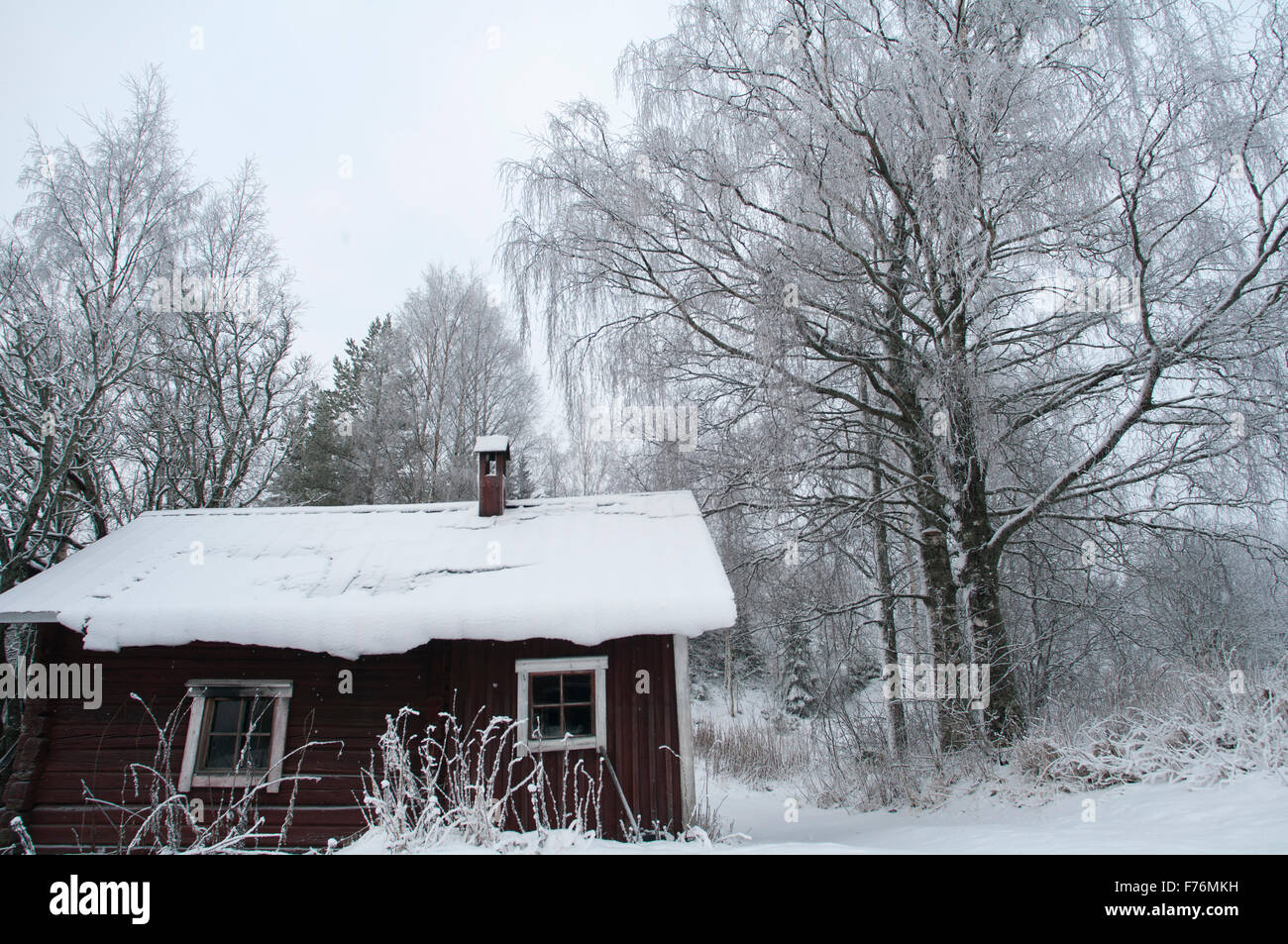 red barn in snow Finland Stock Photo - Alamy