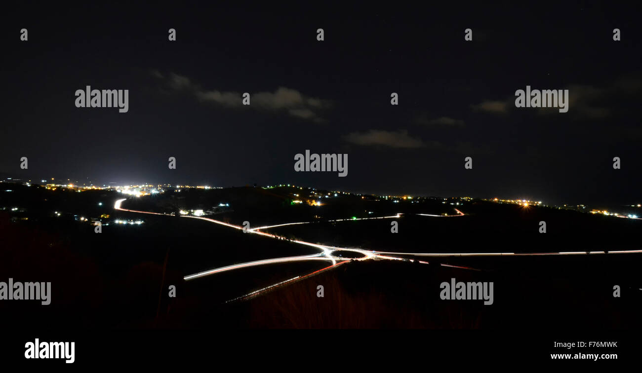 Traffic lights in the night in Italy Stock Photo - Alamy