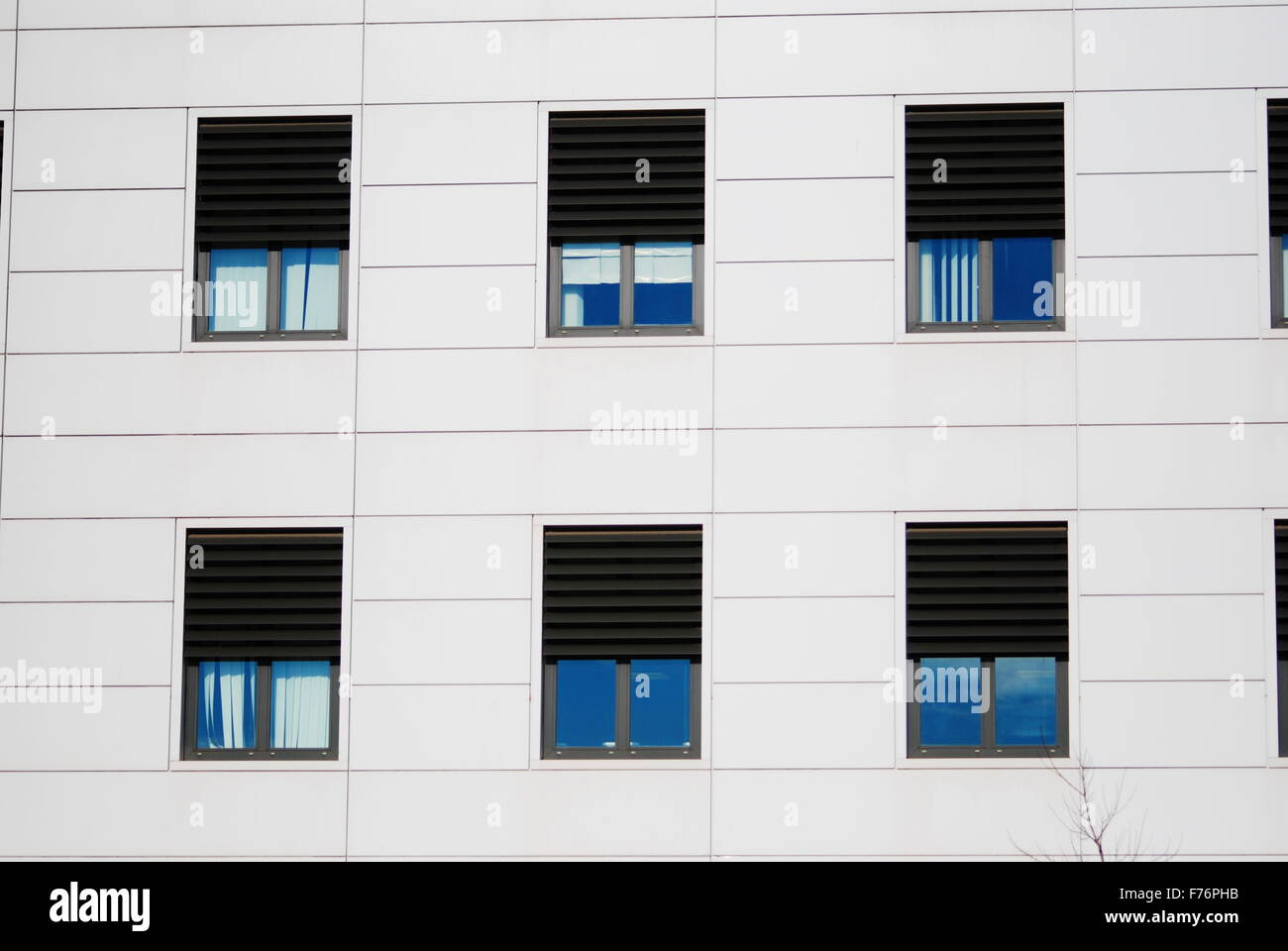 background of wall with windows Stock Photo - Alamy