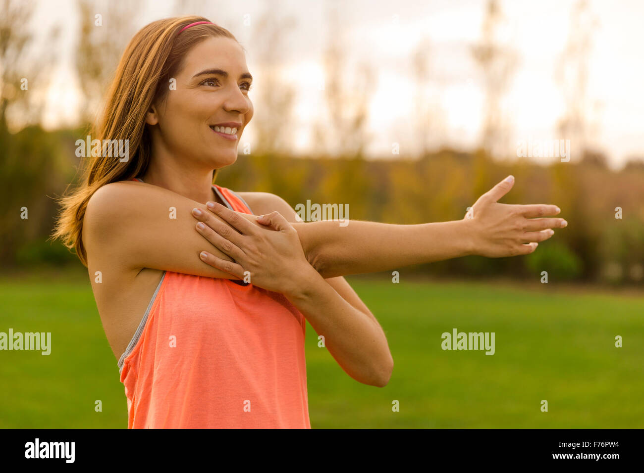 Beautiful woman stretching her muscles after finish the workout Stock ...