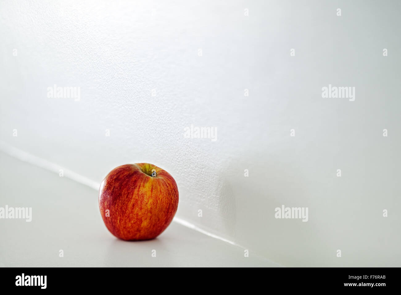 Apple on mantle Stock Photo - Alamy
