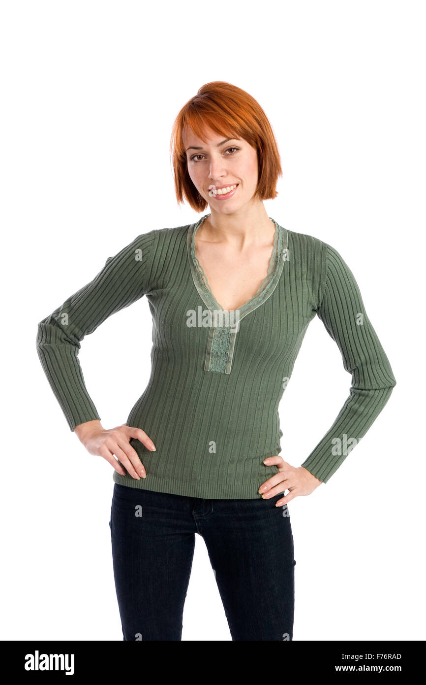 Smiling young attractive woman with hands on hips, isolated on white ...
