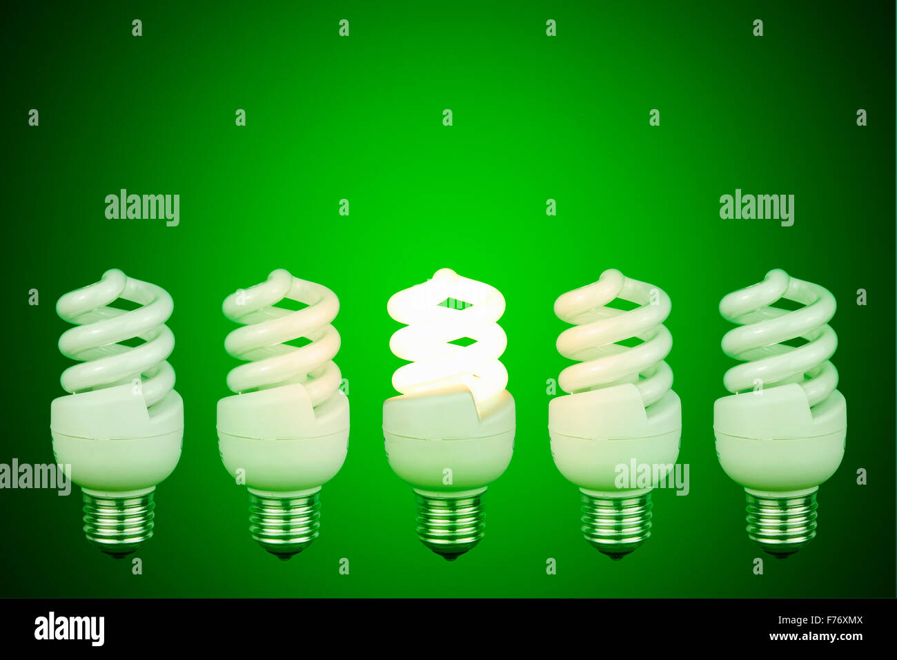 Low energy light bulbs with centre light glowing Stock Photo - Alamy