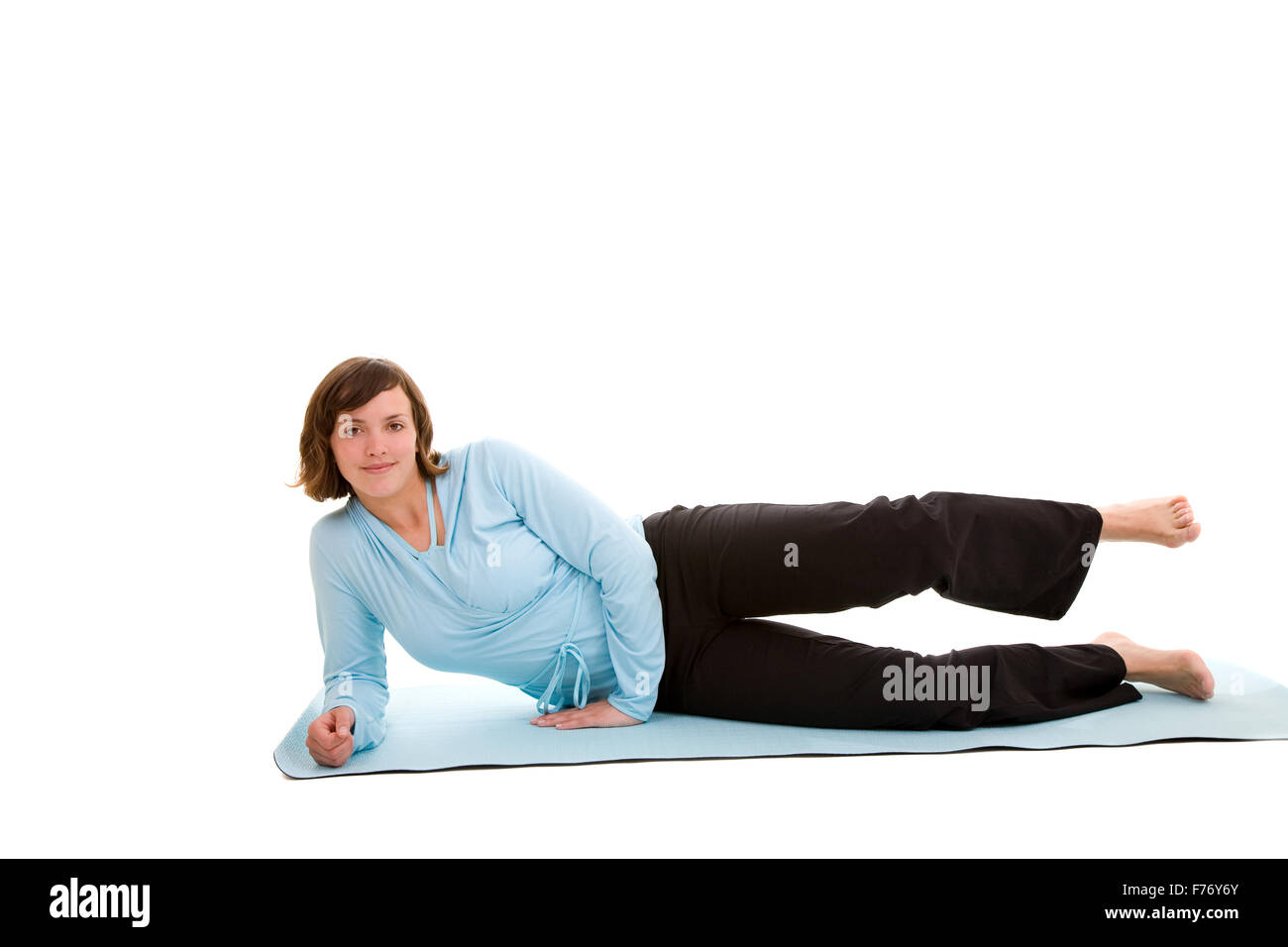 Woman exercises leg Cut Out Stock Images & Pictures - Alamy