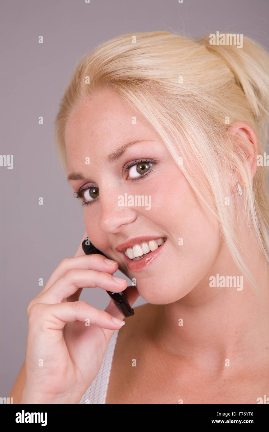 On the phone Stock Photo - Alamy