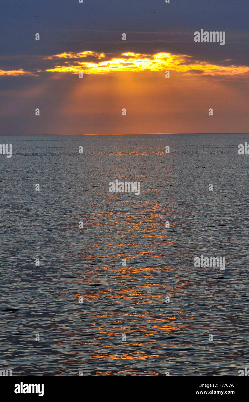 sunset above horizon sea Stock Photo - Alamy