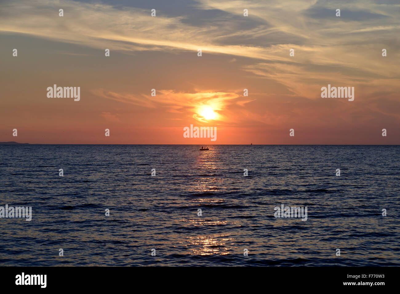 sunset above horizon sea Stock Photo - Alamy