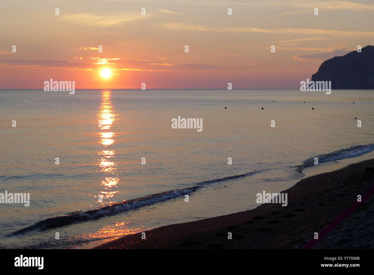 sunset above horizon sea Stock Photo - Alamy