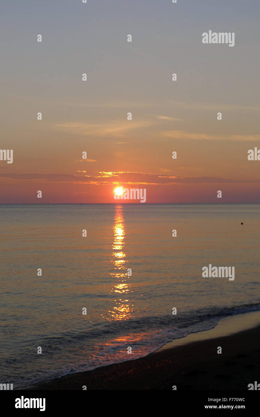 sunset above horizon sea Stock Photo - Alamy