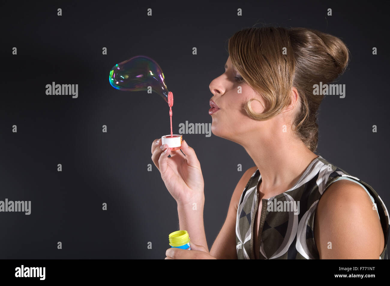 Blowing bubbles retro hi-res stock photography and images - Alamy