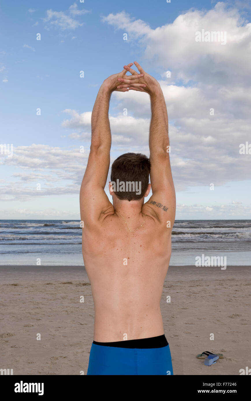 Man in the Sand Stock Photo - Alamy