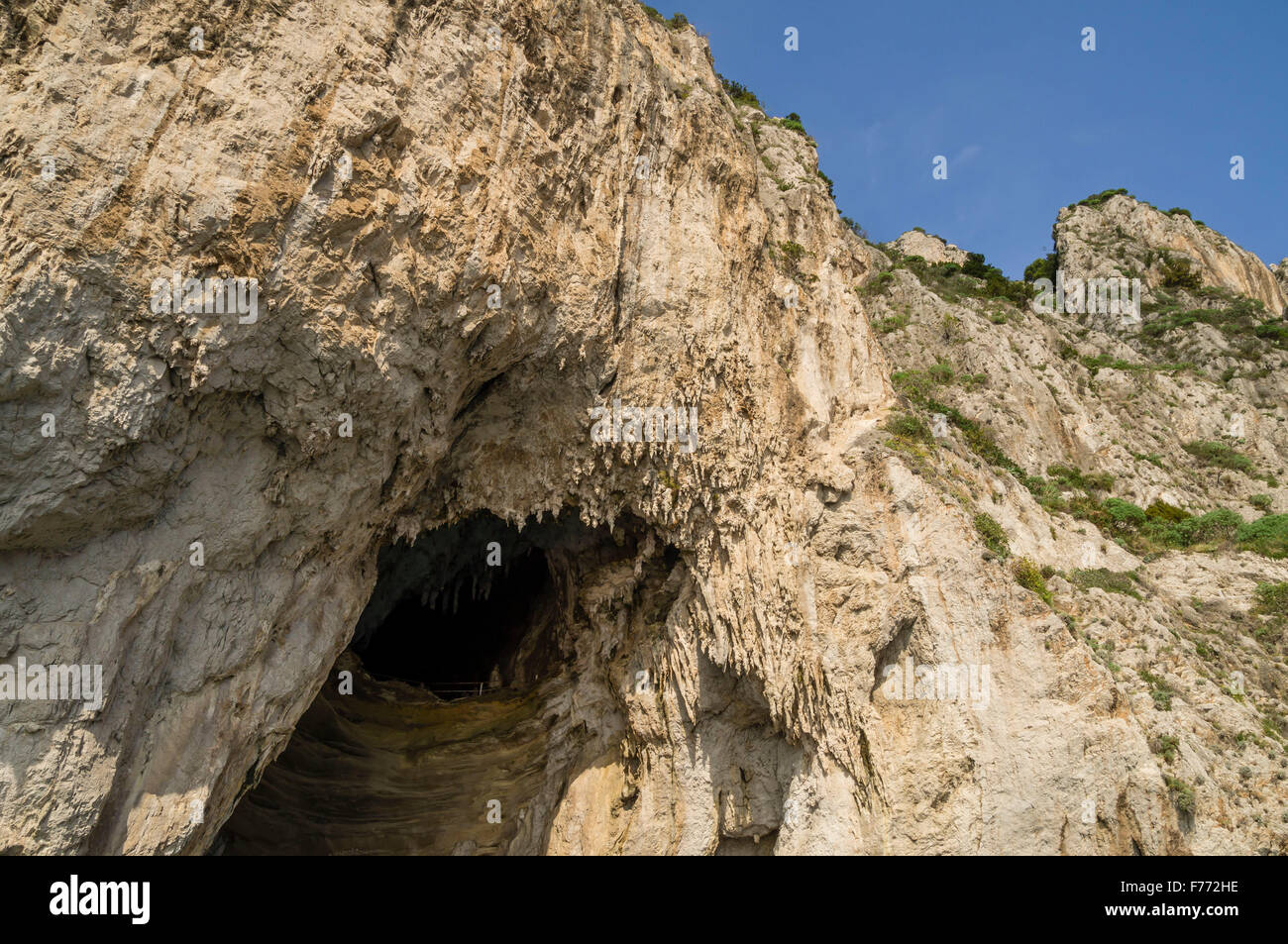 White grotto. Coastal rocks at the Mediterranean Sea in Capri island ...