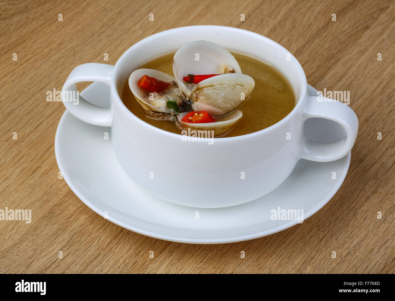 Asian traditional Shell soup on the wood background Stock Photo - Alamy