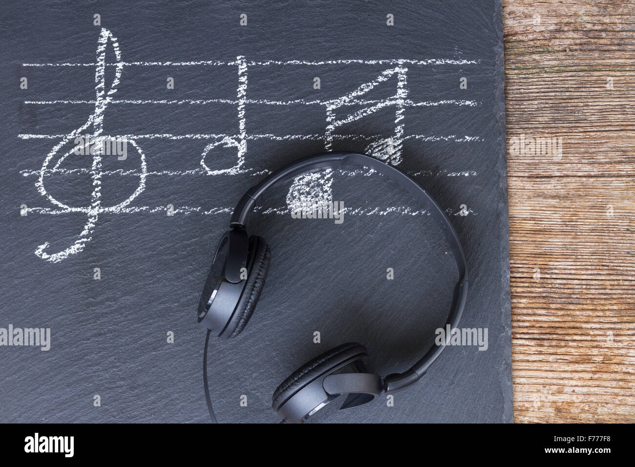 Music notes with headphones Stock Photo - Alamy