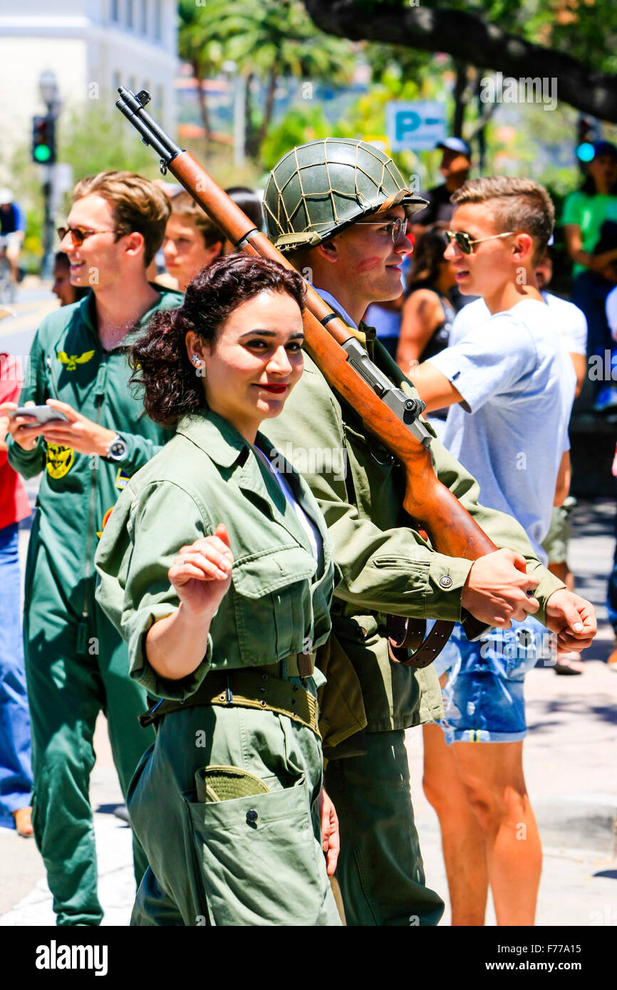 A WW2 actor GI and his sweetheart march down State Street during the ...