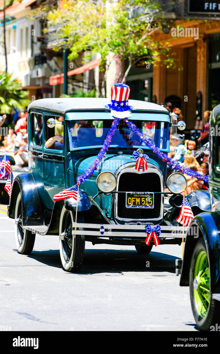 The vintage car group drive their cars along State street bedecked in ...