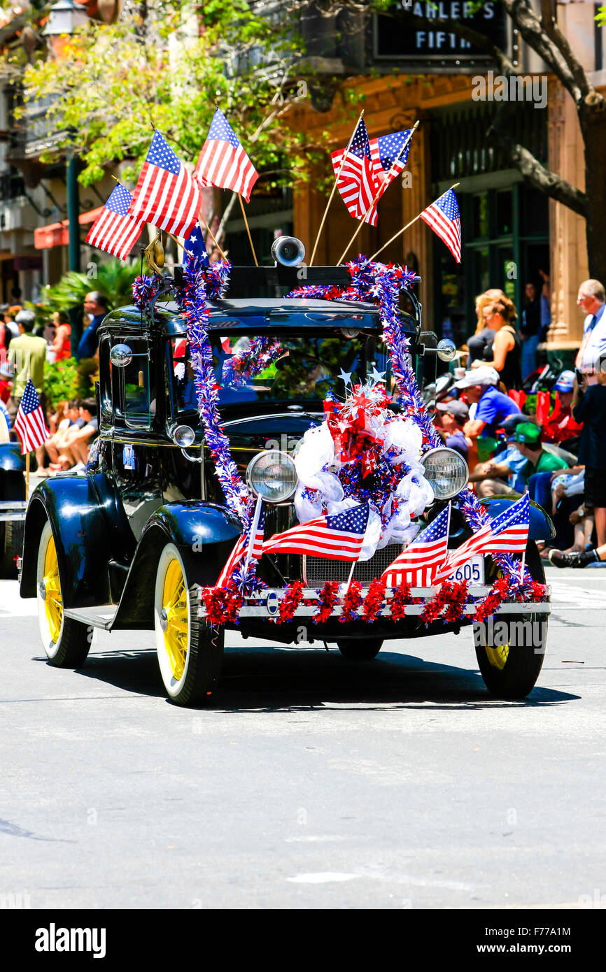 The vintage car group drive their cars along State street bedecked in ...