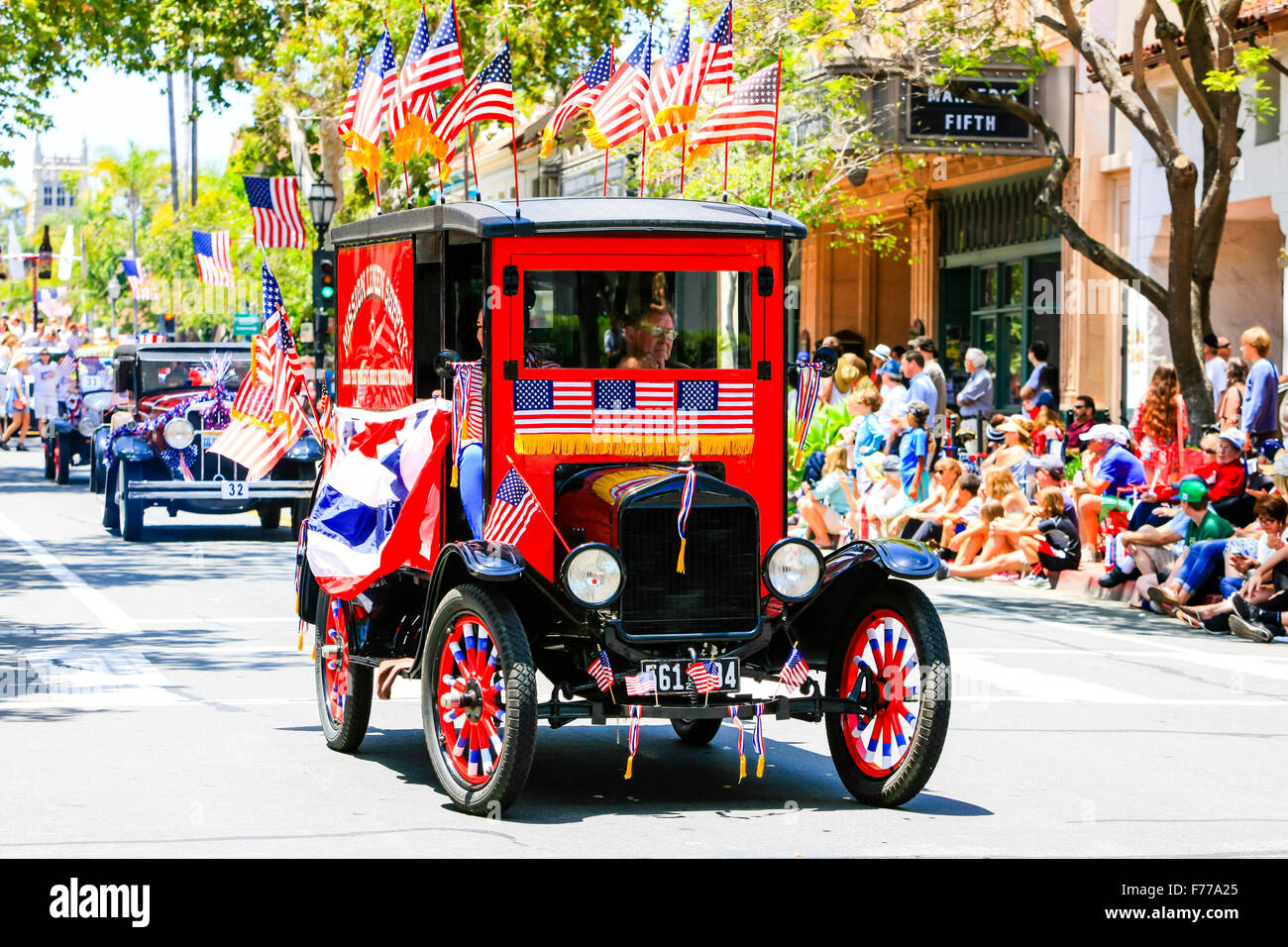 The vintage car group drive their cars along State street bedecked in ...
