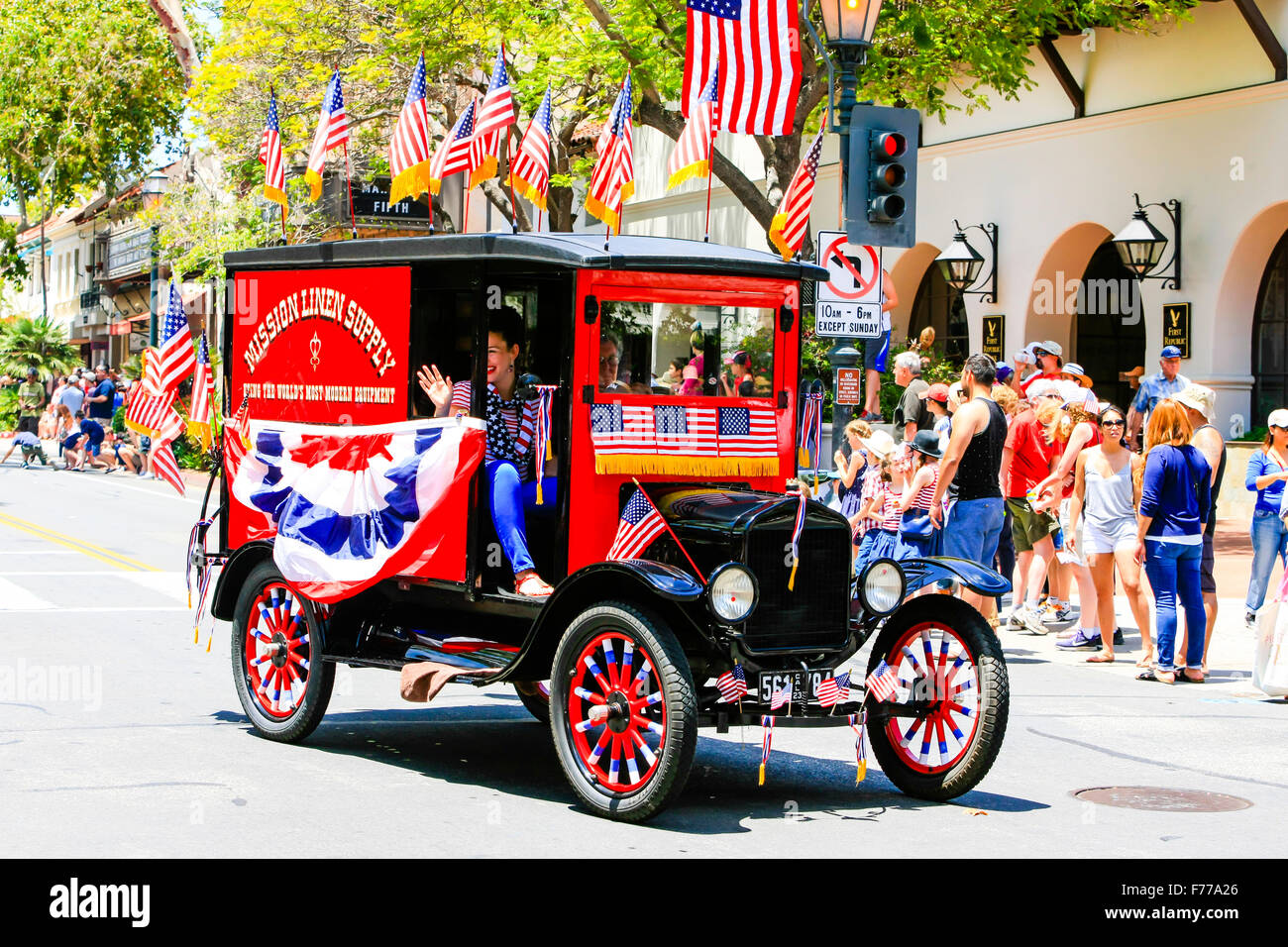 The vintage car group drive their cars along State street bedecked in ...