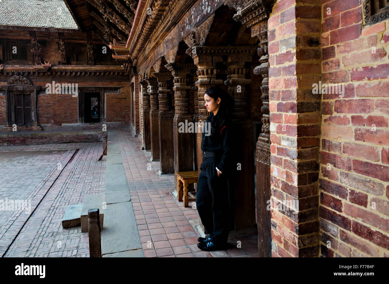 security gurad at the museum in Patan Durbar Square, Lalitpur, Nepal ...