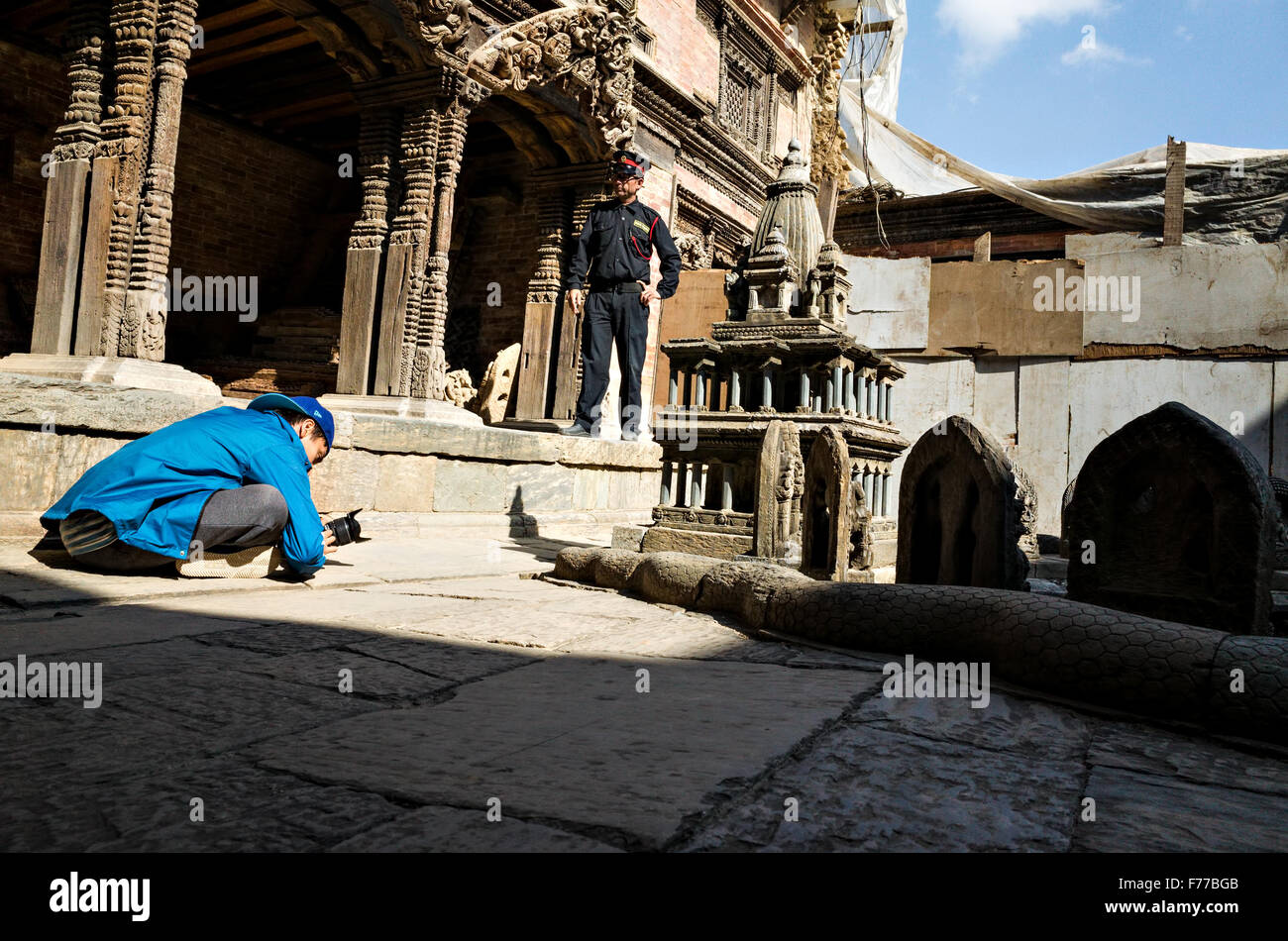 a photographer shooting Patan Durbar Square architecture, Sundari Chowk ...