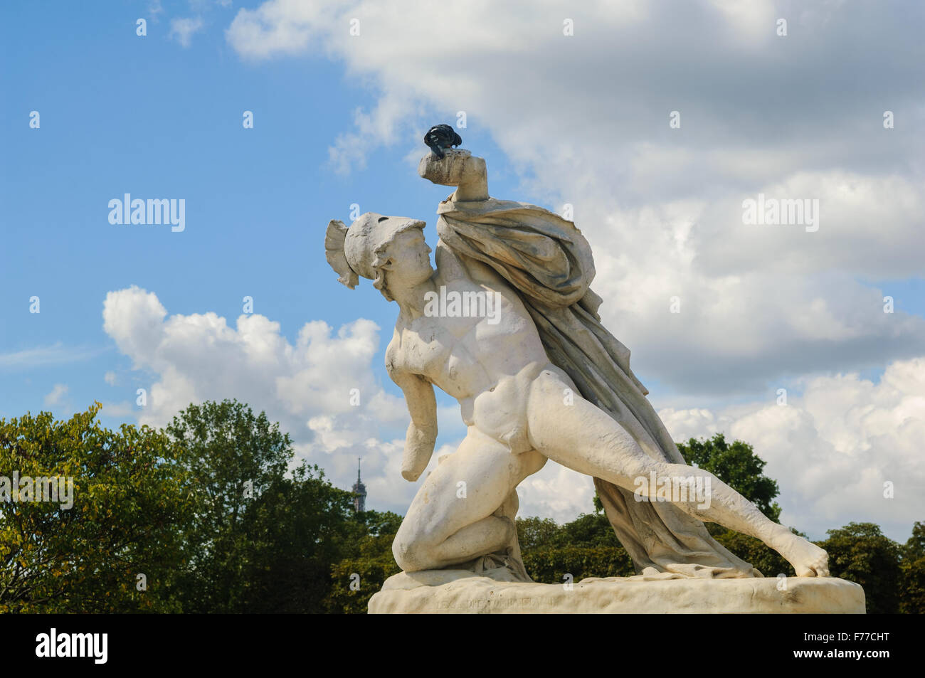 Statue of man covering his face with his had, located in Tuileries ...