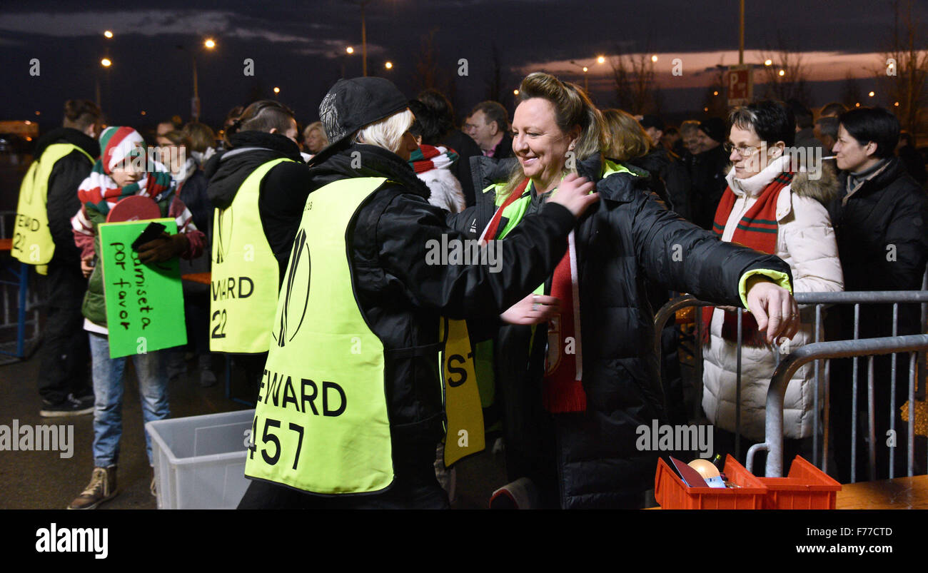 Augsburg, Germany. 26th Nov, 2015. People are frisked outside the Arena ...
