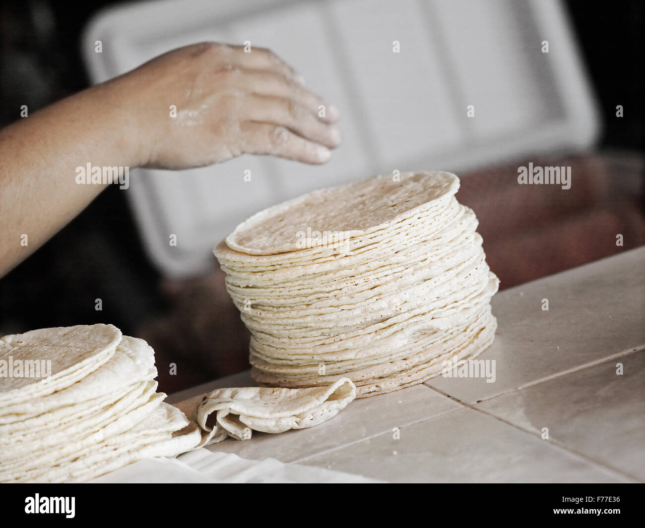 Tortilla chips hand hi-res stock photography and images - Alamy