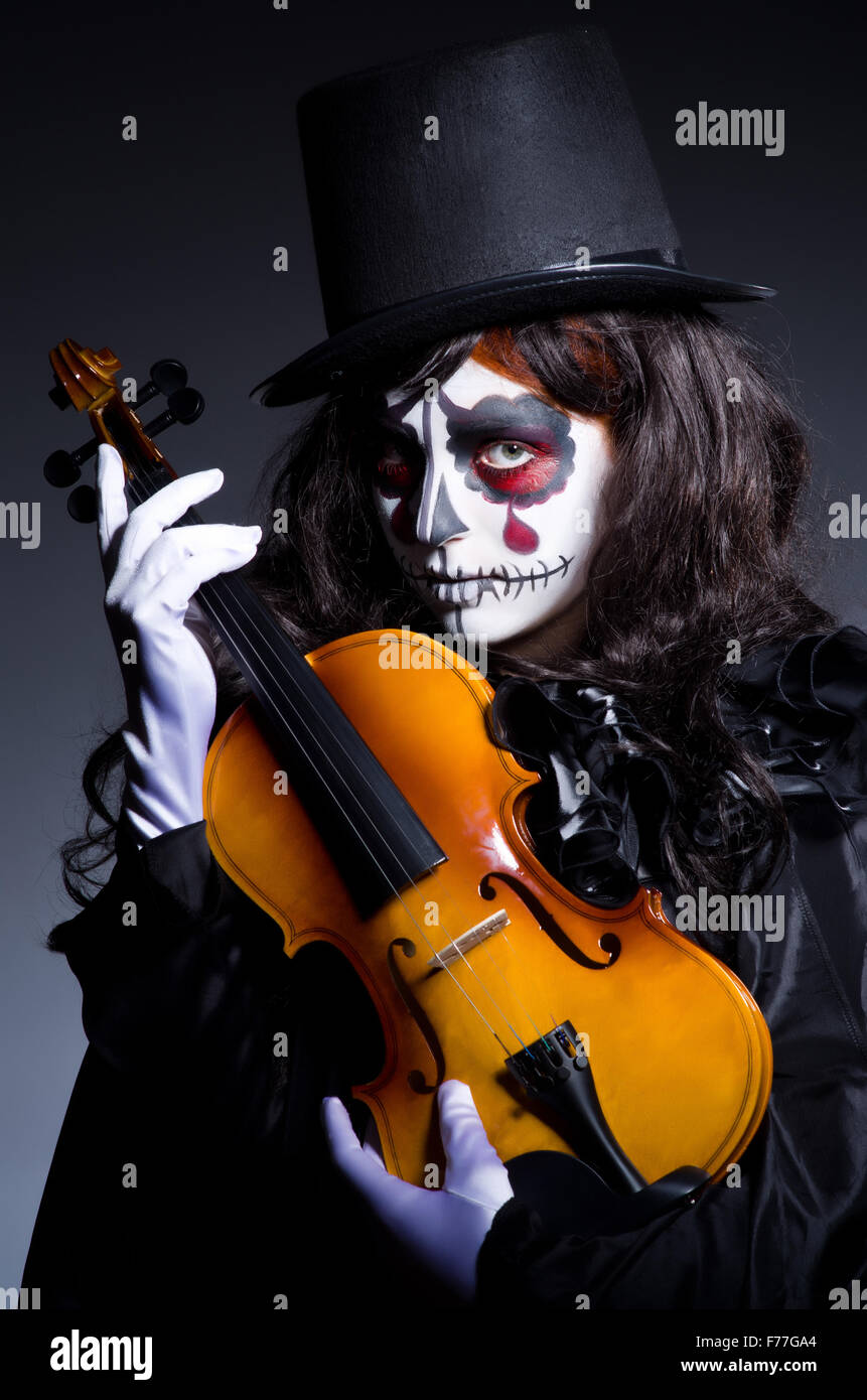 Fiddle playing devil hi-res stock photography and images - Alamy