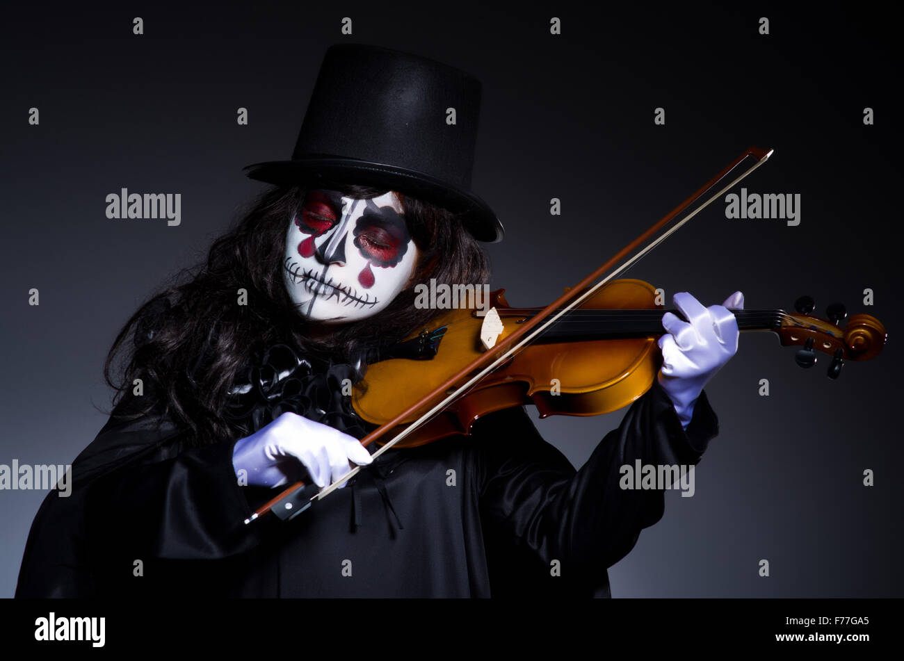 Death playing the fiddle hi-res stock photography and images - Alamy