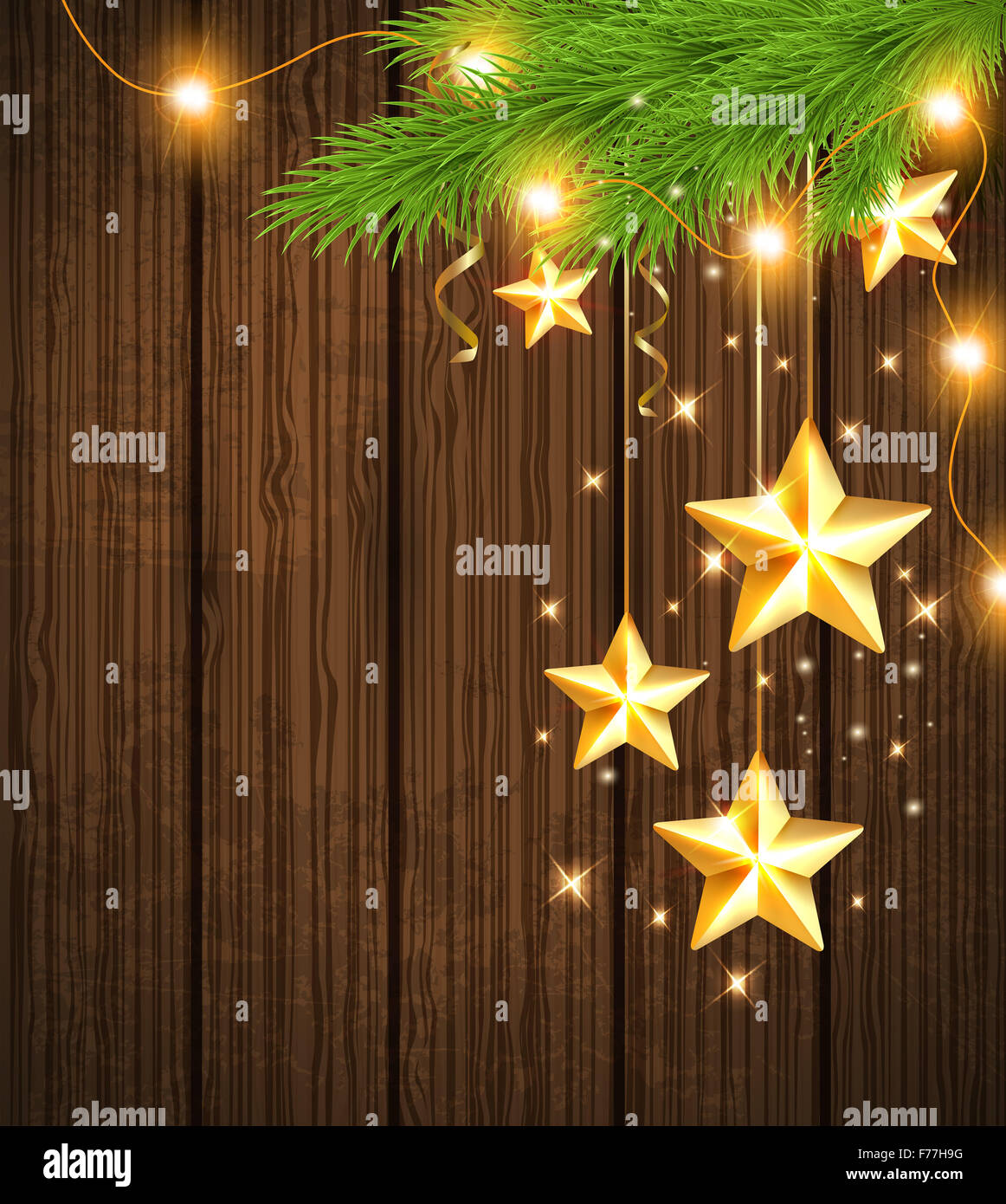 Wooden Christmas background with shining golden stars and fir tree ...