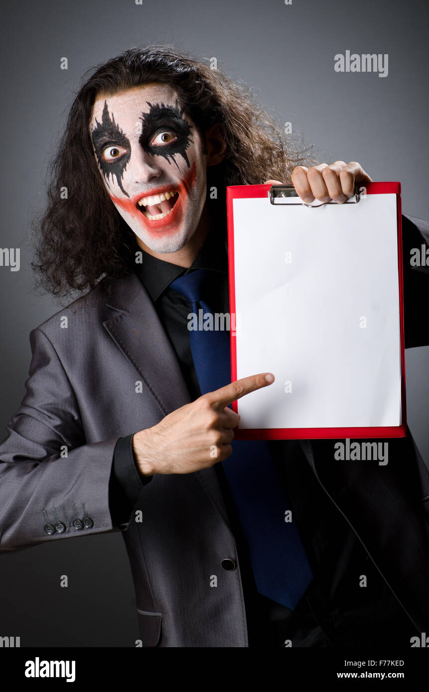 Funny Joker with paper binder Stock Photo - Alamy