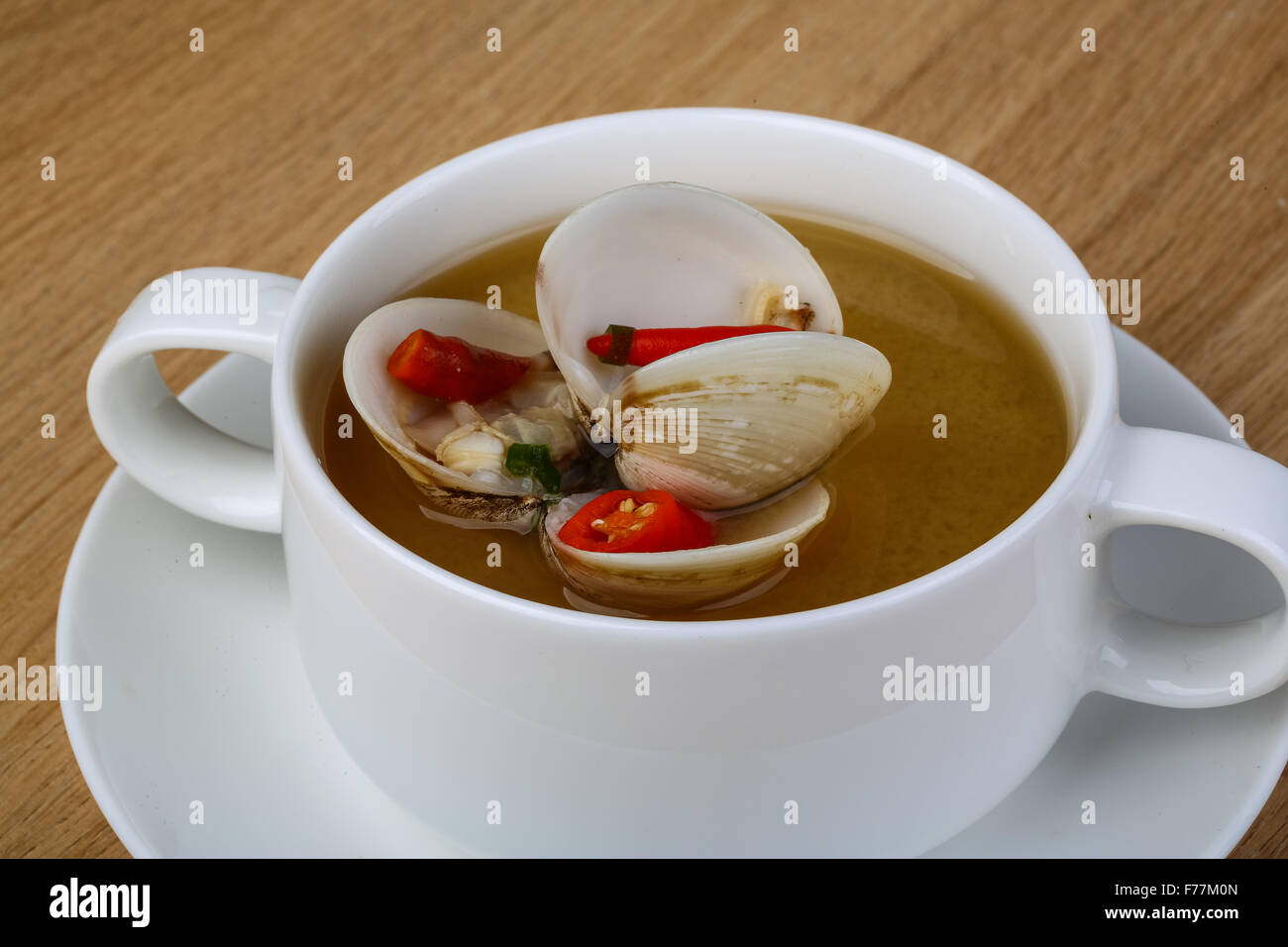Asian traditional Shell soup on the wood background Stock Photo - Alamy