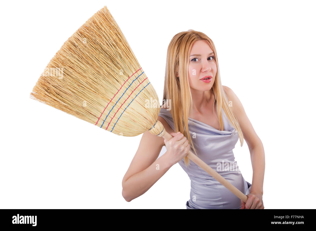 Young woman with broom on white Stock Photo - Alamy